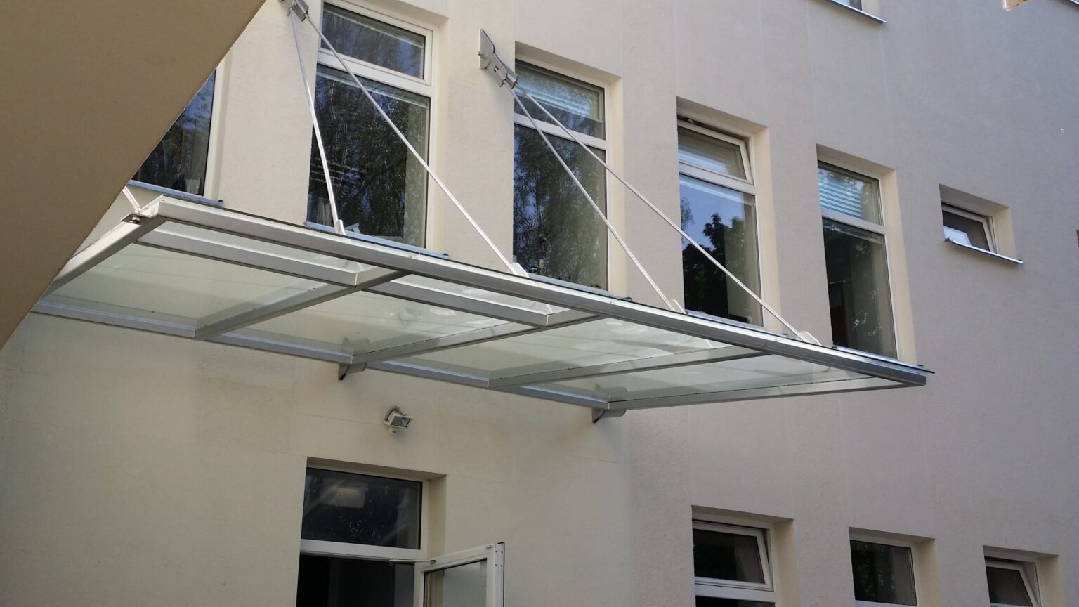 Glass Canopies In Modern Architecture - NYC Glass & Mirrors